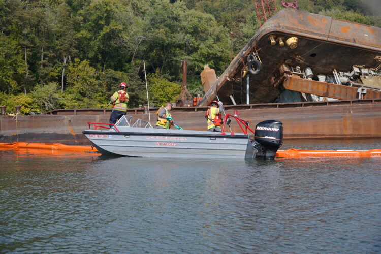Work continues to clean up overturned dredge boat | News, Sports, Jobs ...